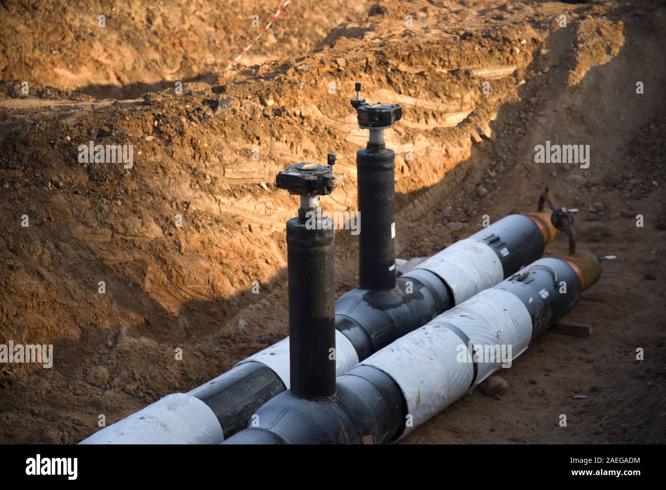 Laying of underground storm sewer pipes. Installation of water main ...