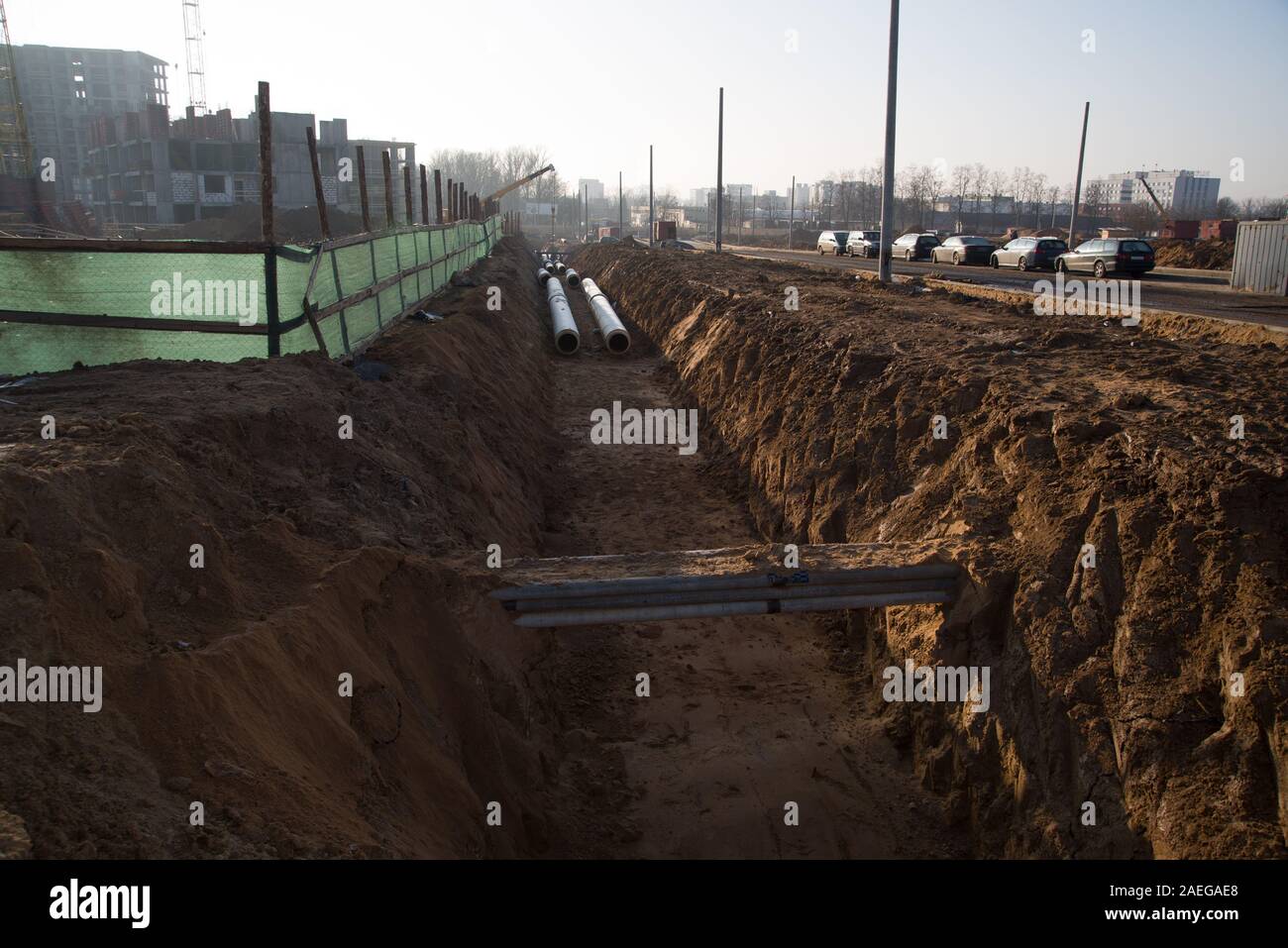 Laying of underground storm sewer pipes. Installation of water main ...