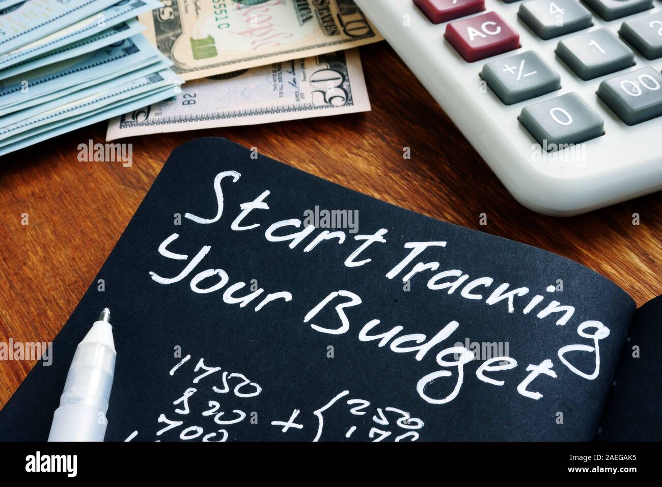 Start tracking your budget sign with home finances calculations Stock ...