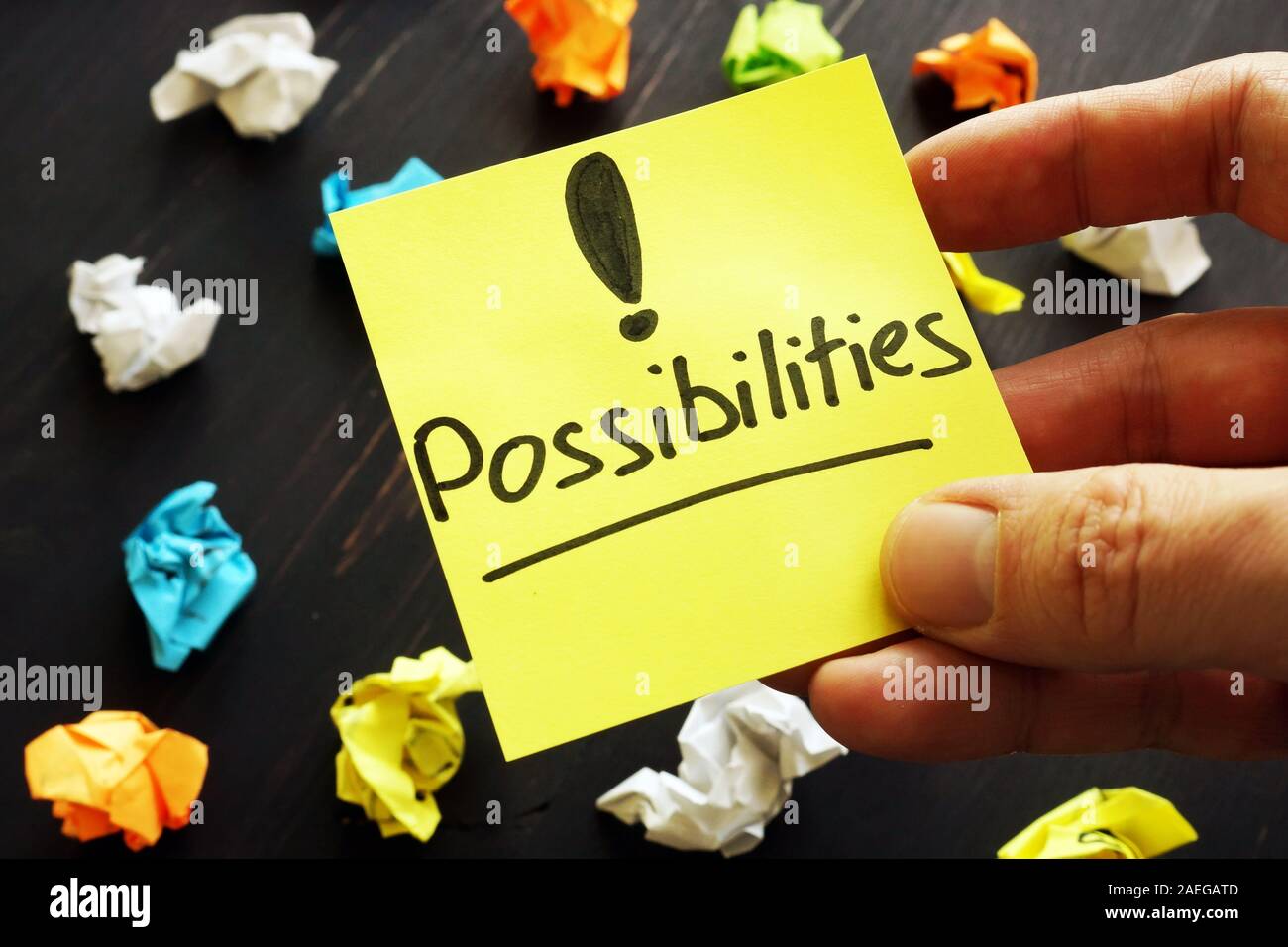 Possiblities sign on memo and paper balls Stock Photo - Alamy