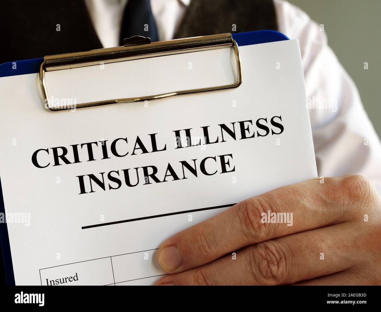 Critical illness insurance application form in the hands Stock Photo ...