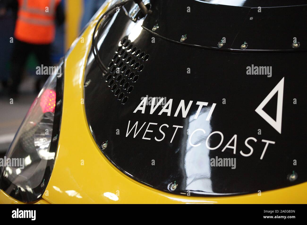 Back of an Avanti West Coast train showing the new logo as it departs ...