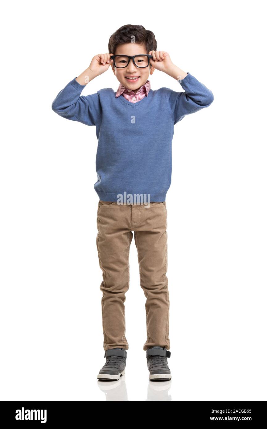 Happy little boy wearing glasses Stock Photo - Alamy