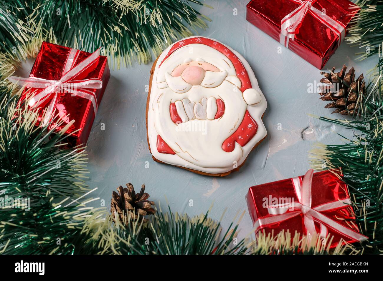 Gingerbread Santa Claus on a festive blue background, Happy New Year ...