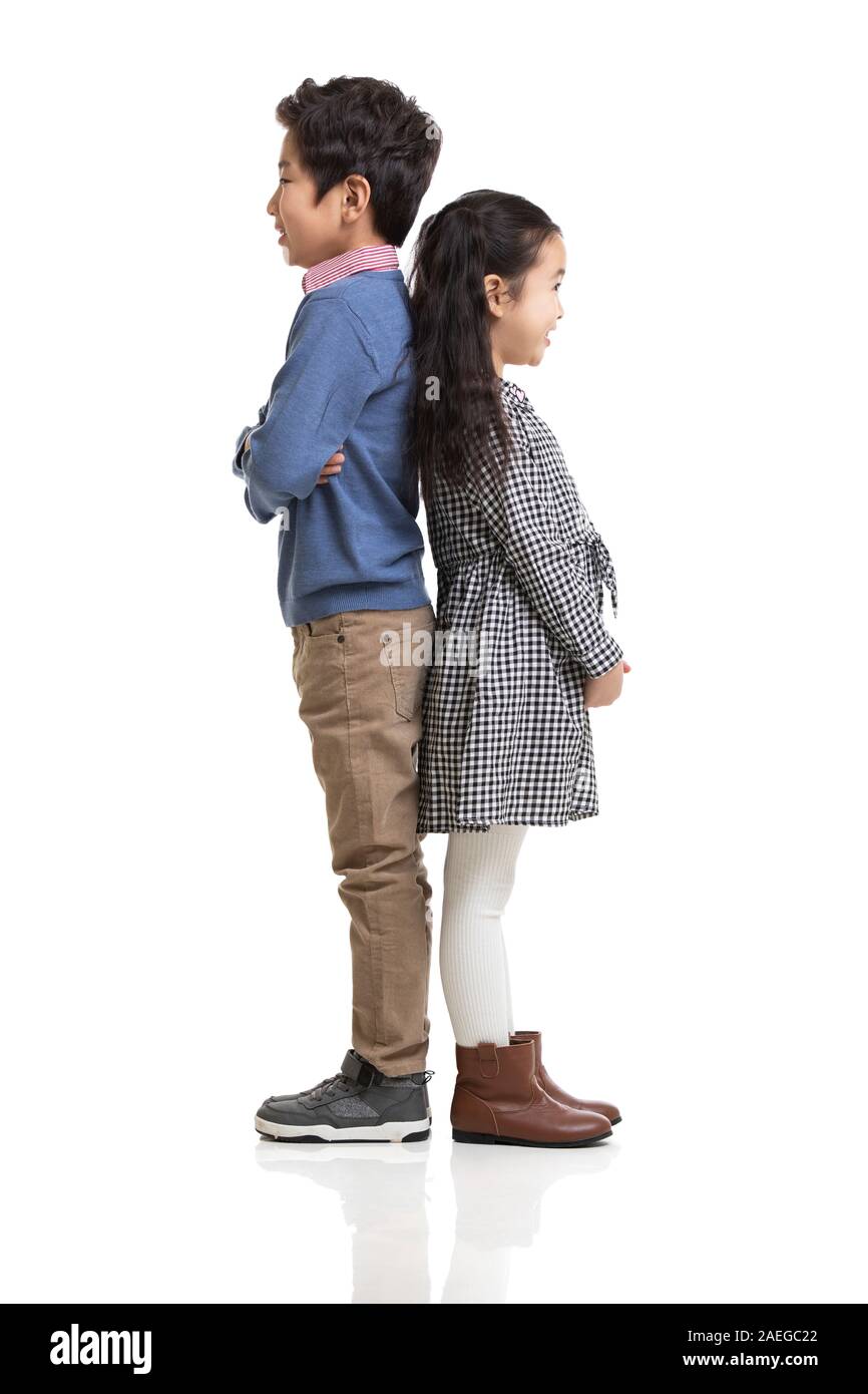 Children standing and looking away Cut Out Stock Images & Pictures - Alamy