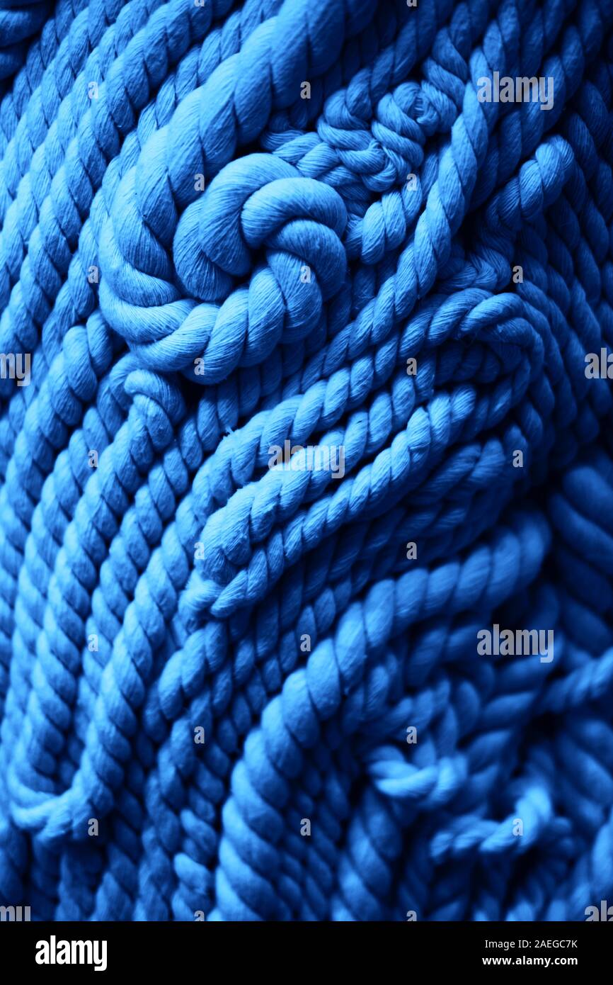 Backdrop made with ropes in blue trendy color Stock Photo - Alamy