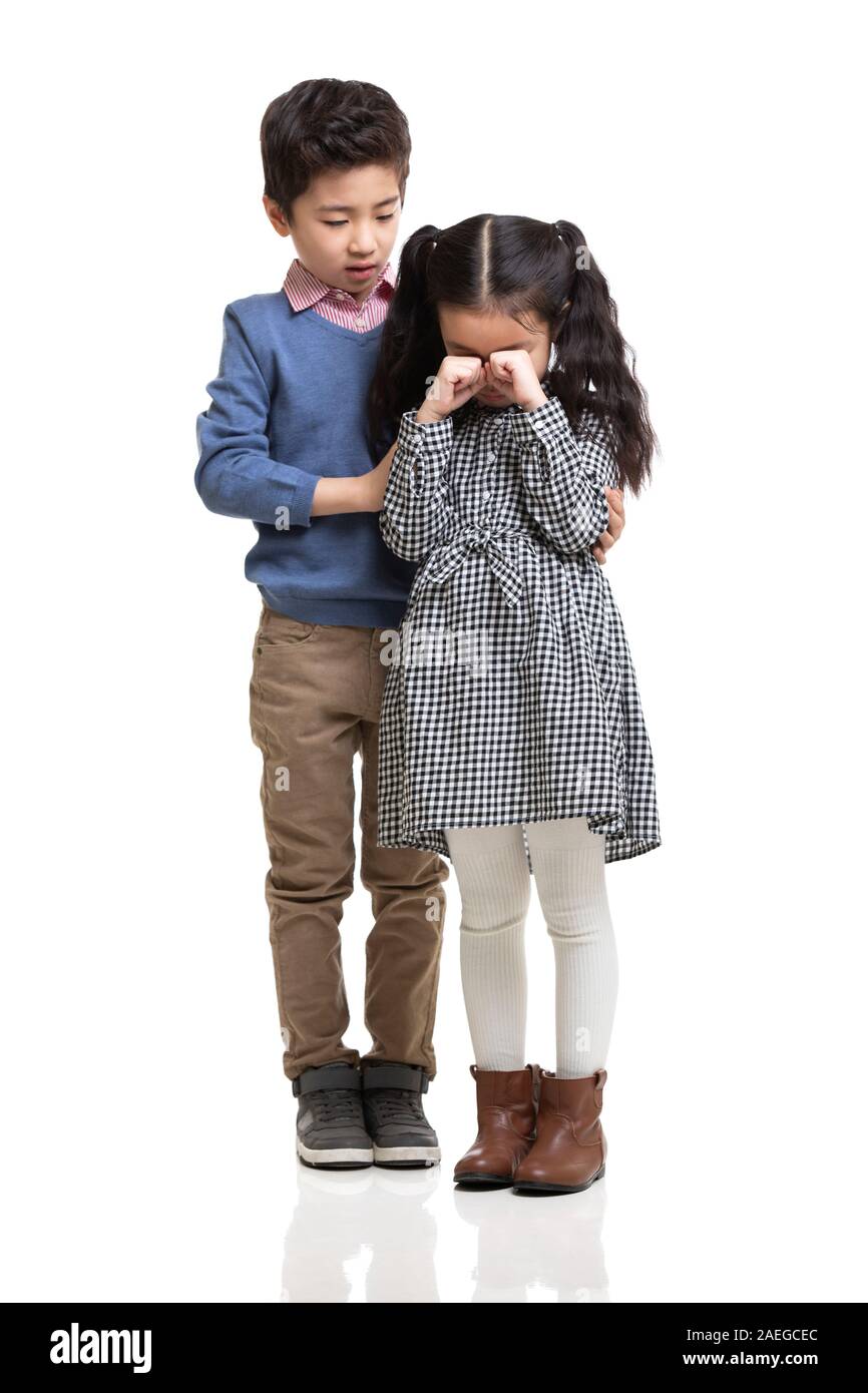 Little boy consoling a friend Stock Photo - Alamy