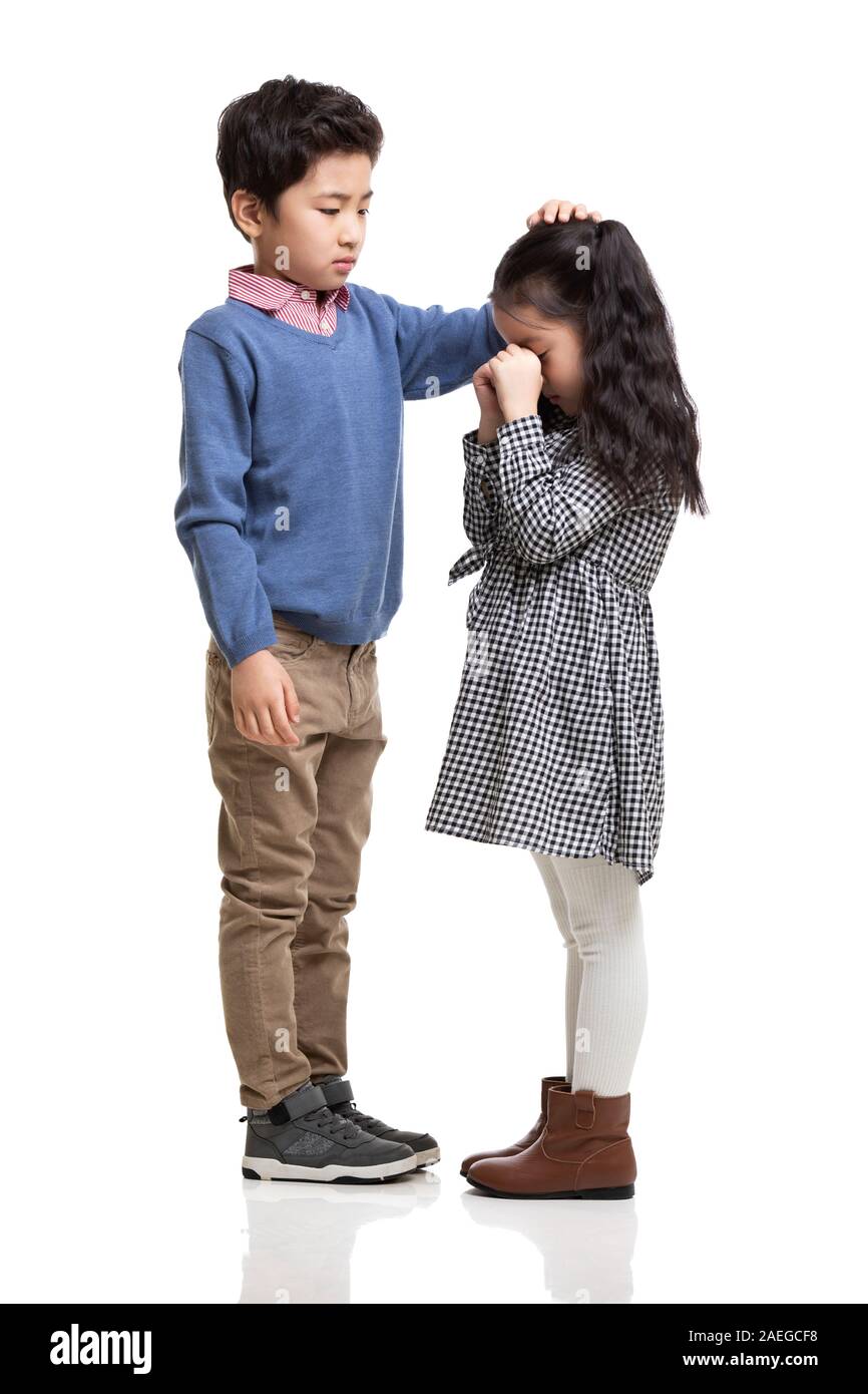 Children boys consoling hi-res stock photography and images - Alamy