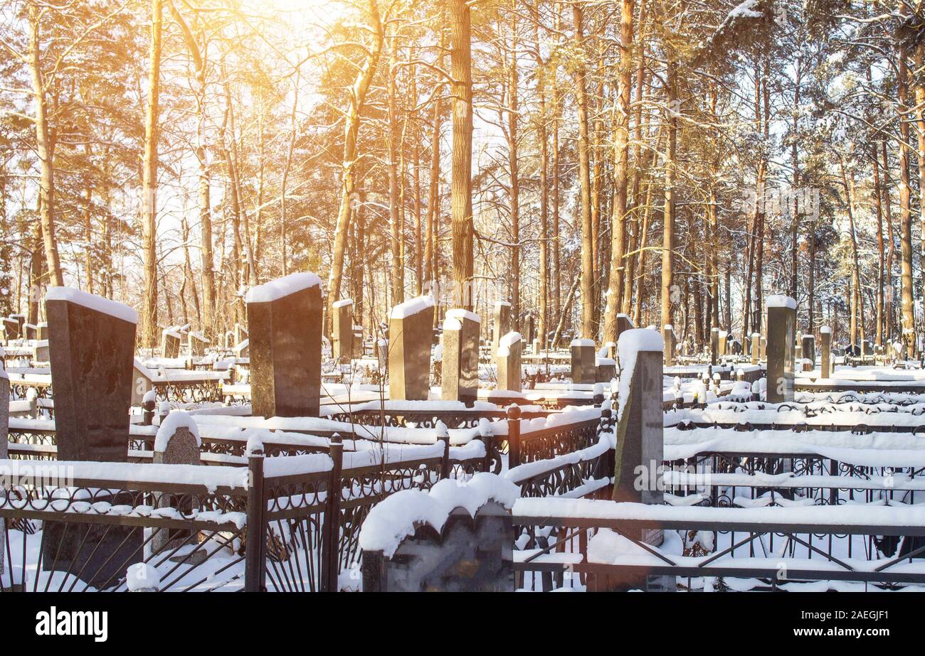 Winter time. Cemetery with monuments under the snow, background ...