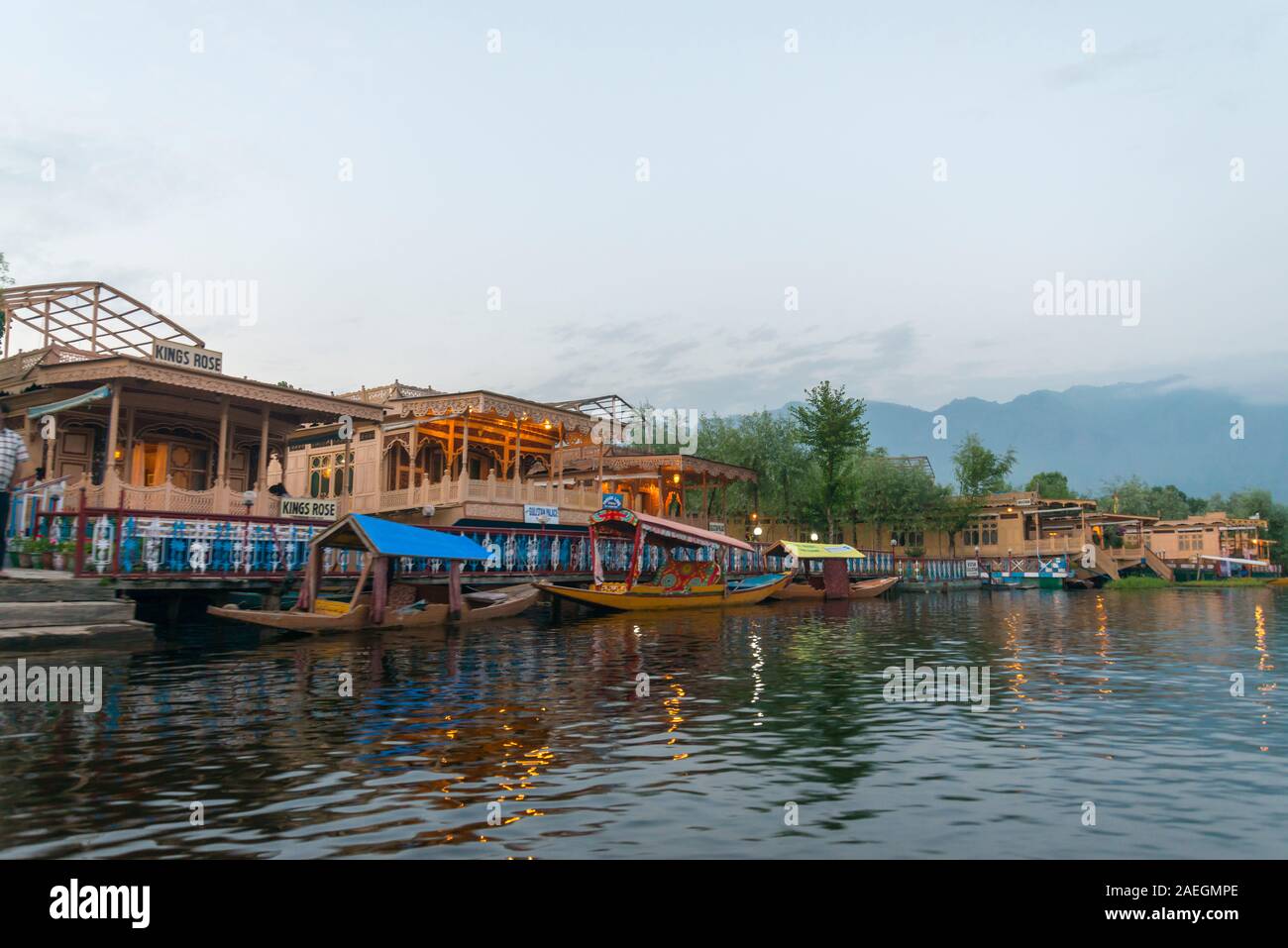 Houseboats and shikaras in Dal Lake during Twilight, Srinagar,India ...
