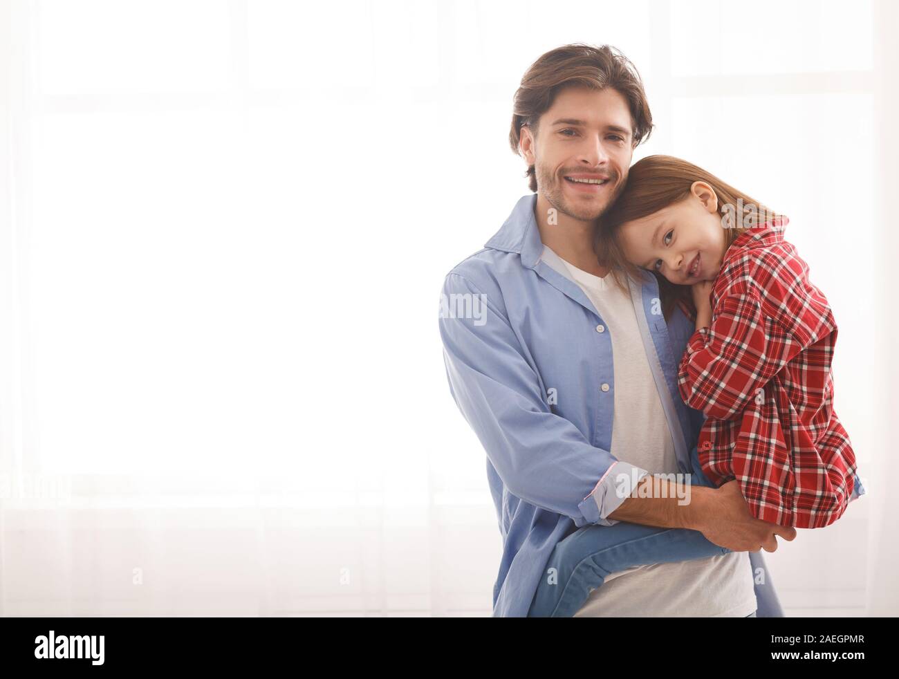 Daddy and little girl bonding over white background Stock Photo - Alamy
