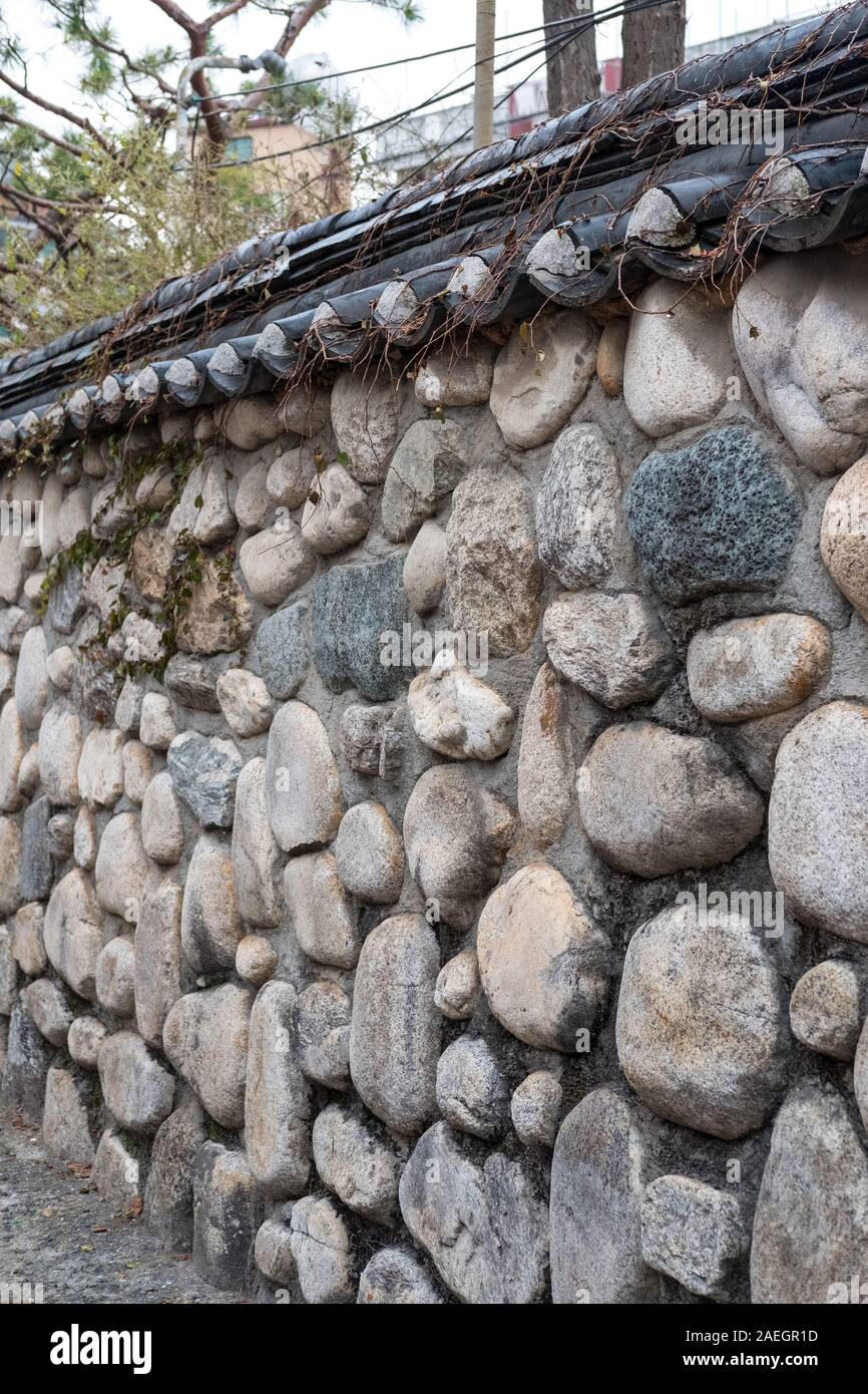 Traditional stone wall boundary with roof Stock Photo - Alamy