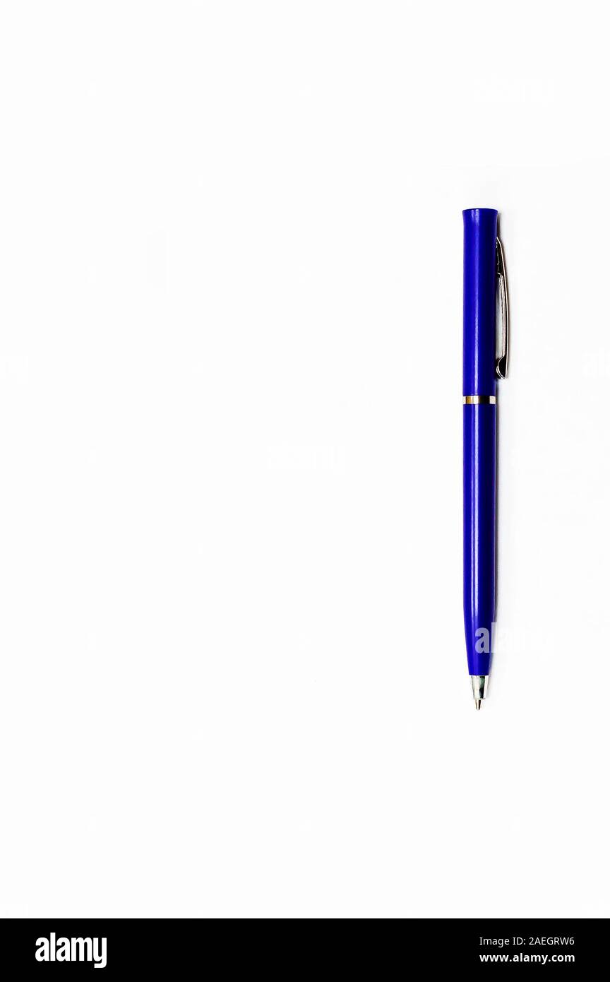 Blue pen on white vertical clear piece of paper. Concept isolate. Copy ...