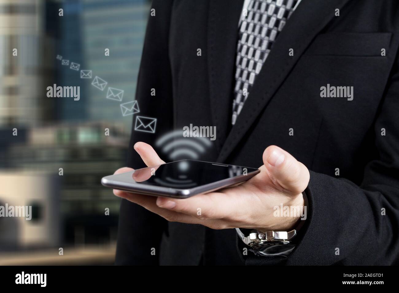 Businessman Sending Mail via Smartphone. Digital Wireless Technology ...