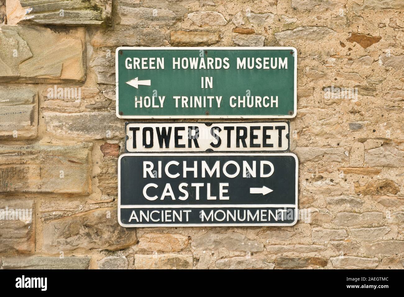 Street signs on wall of Tower Street of Richmond for the Green Howards ...