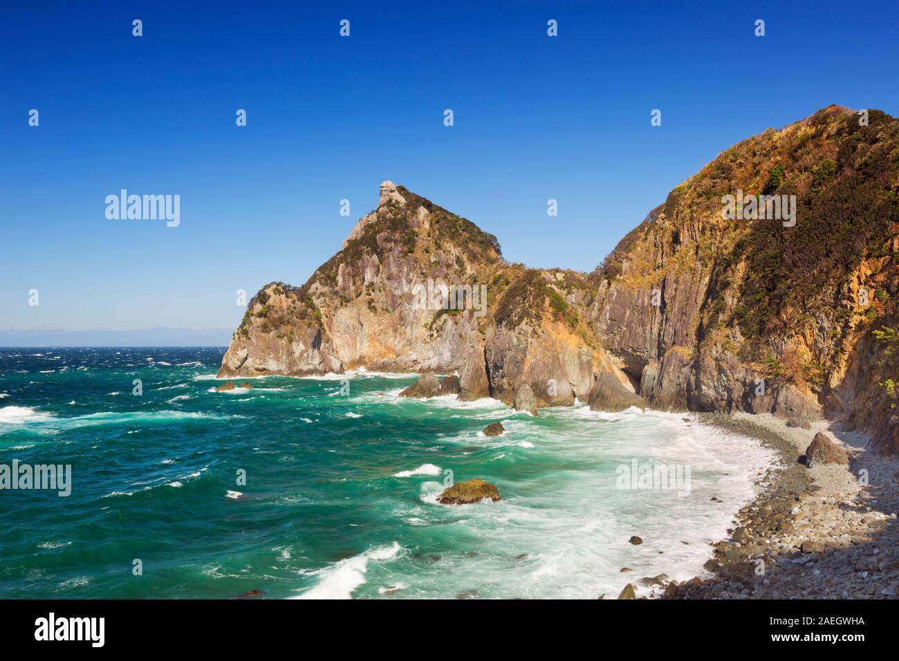 The rocky coastline of the Izu Peninsula in Japan on a beautiful bright ...