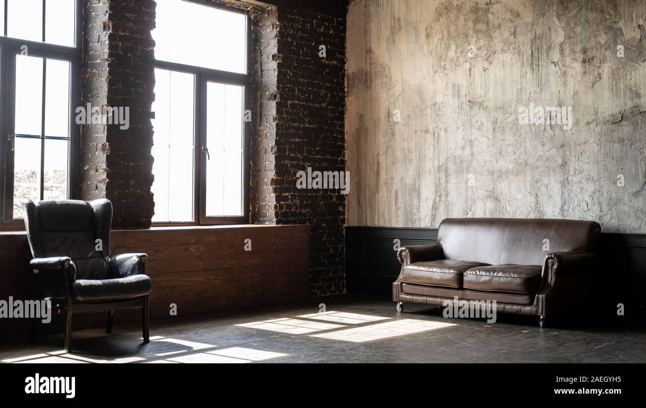 Spacious empty loft room with large windows Stock Photo - Alamy