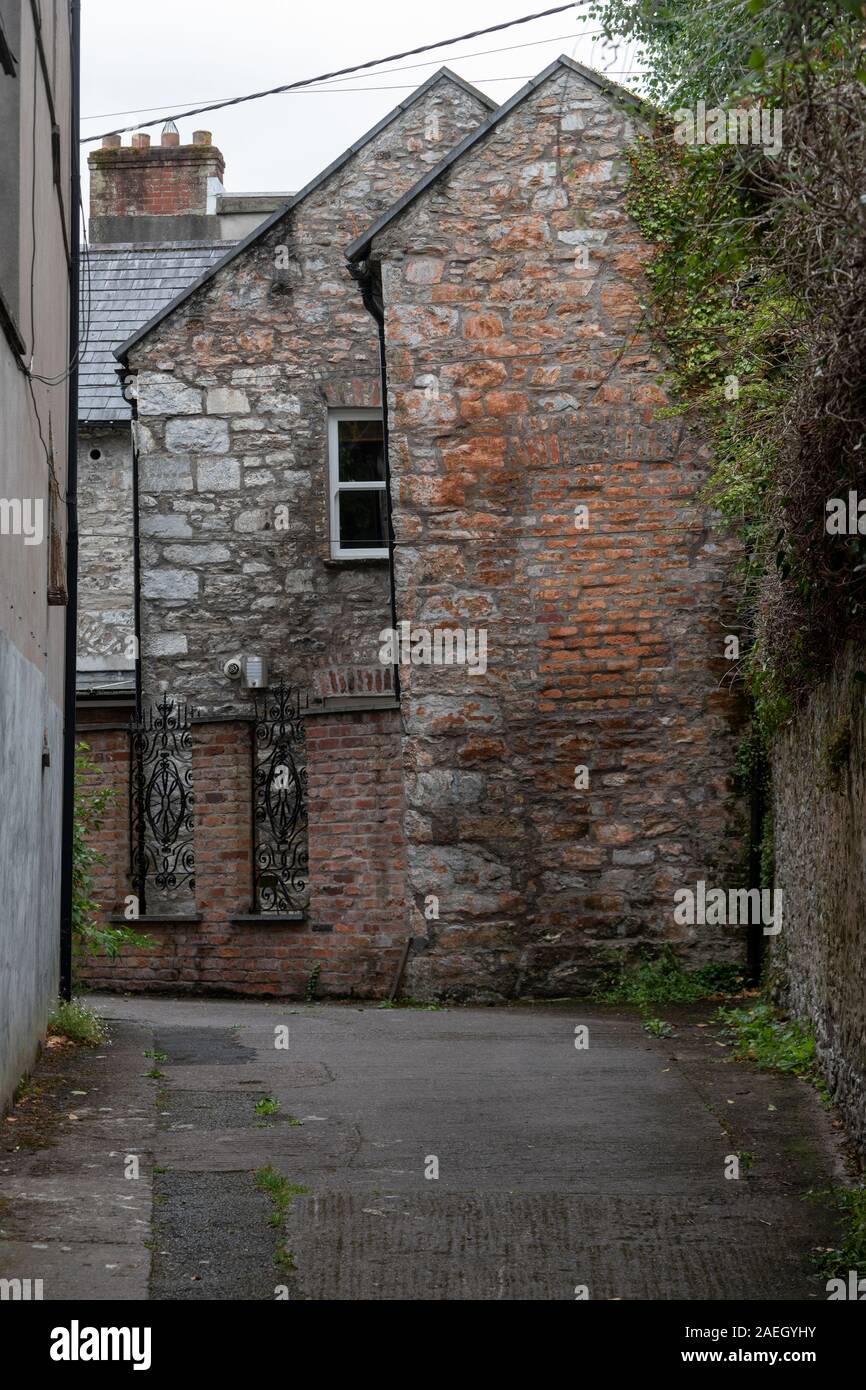 Empty narrow alley amidst buildings town hi-res stock photography and ...