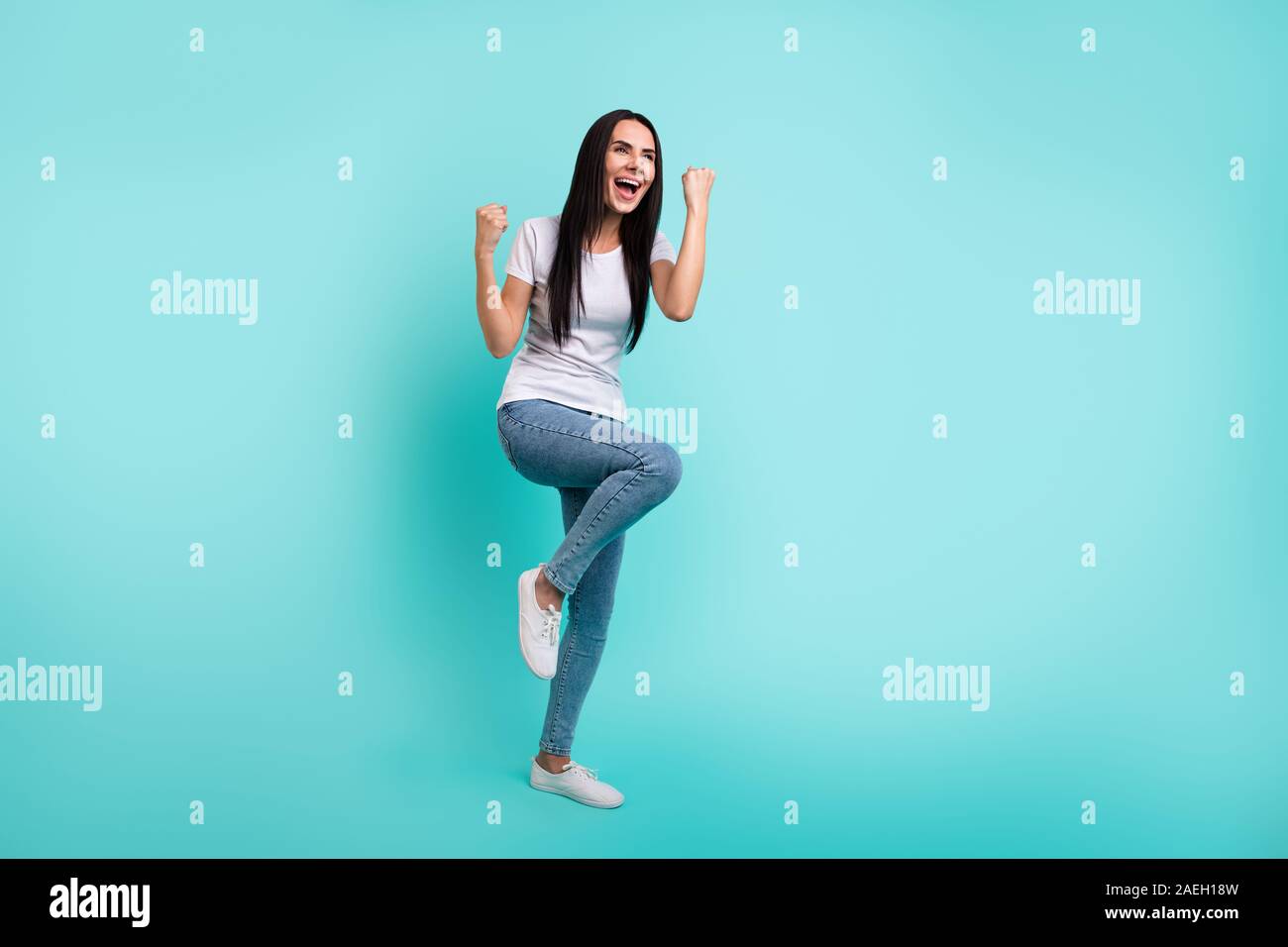 Full length body size turned photo of cheerful crazy rejoicing ecstatic ...