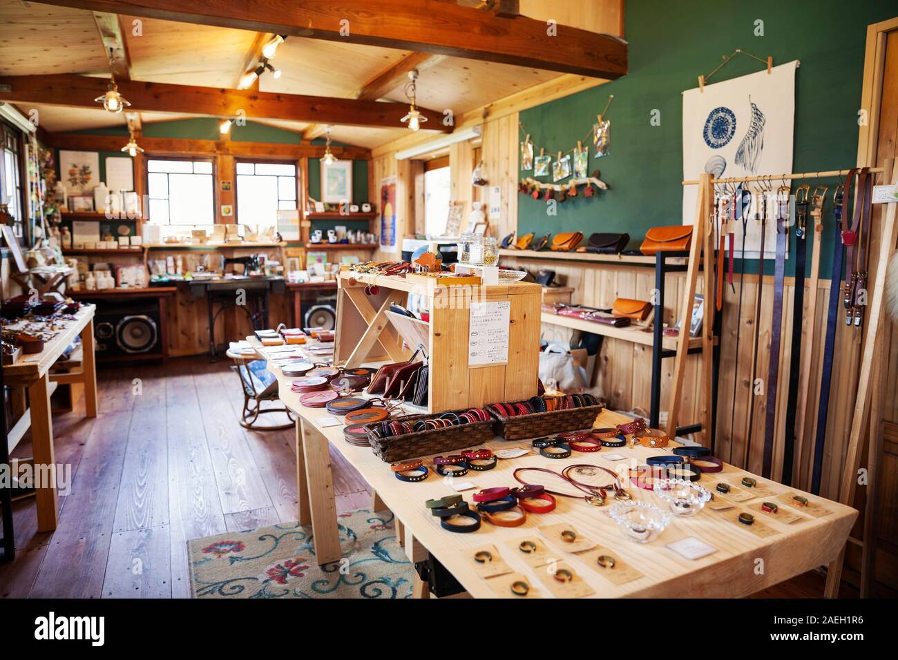 Interior view of a leather shop selling belts, bracelets and handbags ...