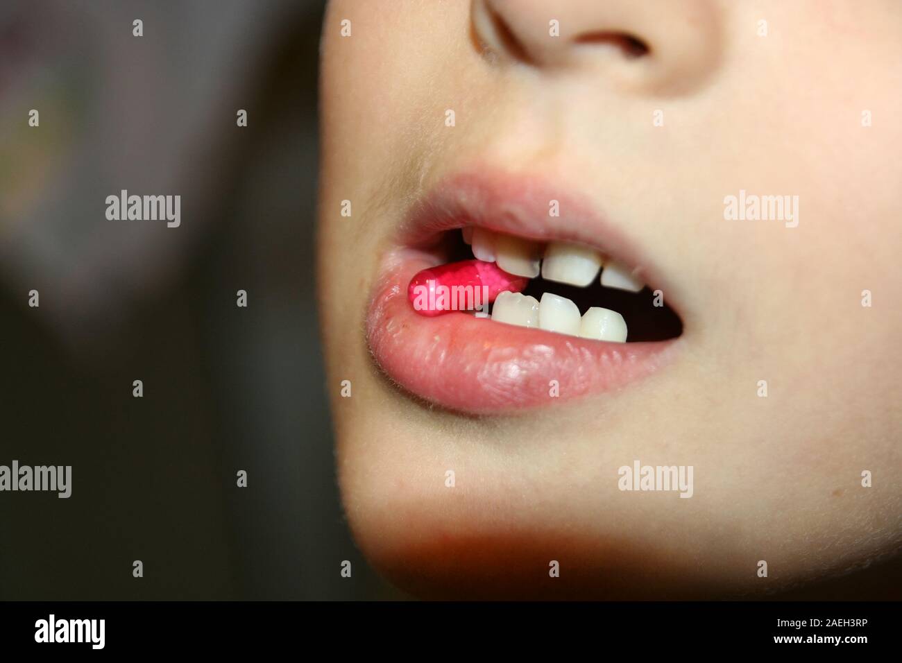 Kid taking pills. Kid taking antibiotics. Child using medical pills ...