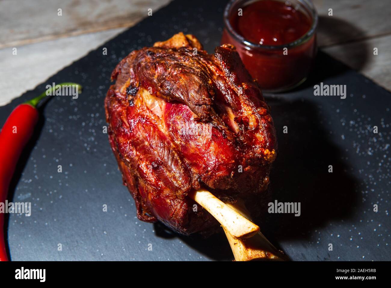 Meat is cooked in the barbecue. Pig balance Stock Photo - Alamy