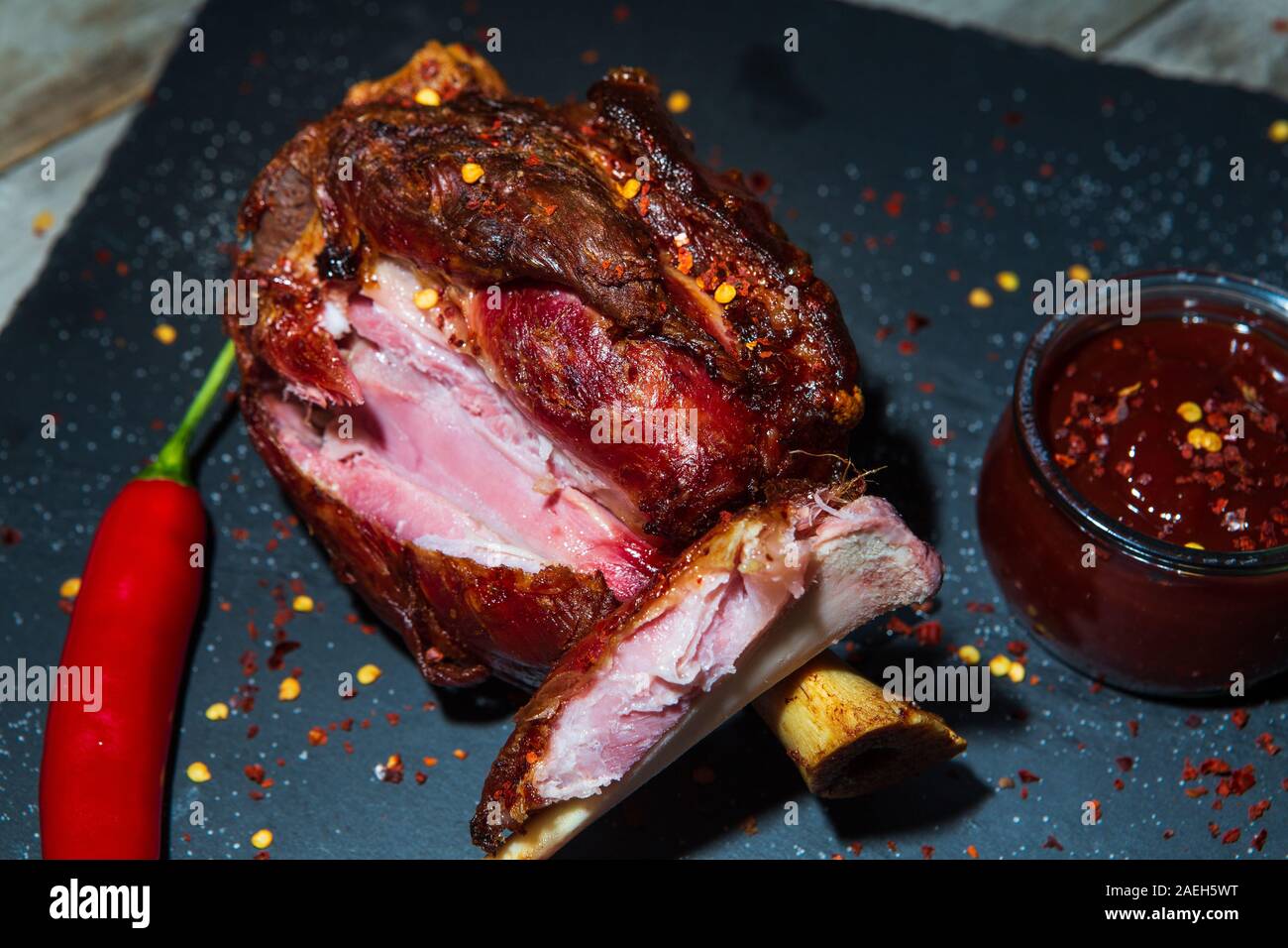 Meat is cooked in the barbecue. Pig balance Stock Photo - Alamy