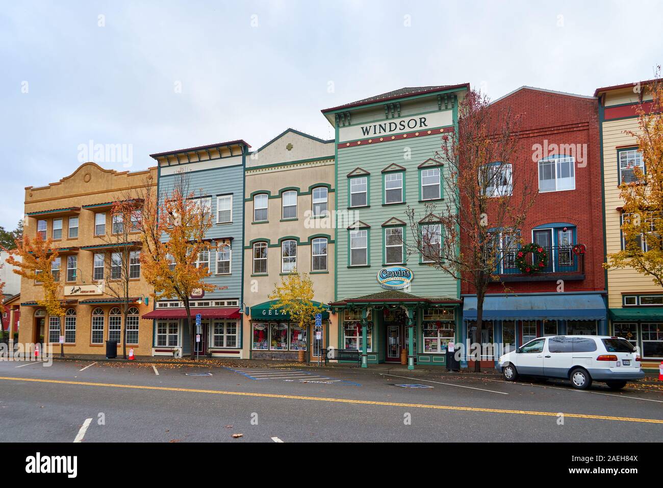 Colorful store-front apartment buildings on a cloudy autumn day in ...