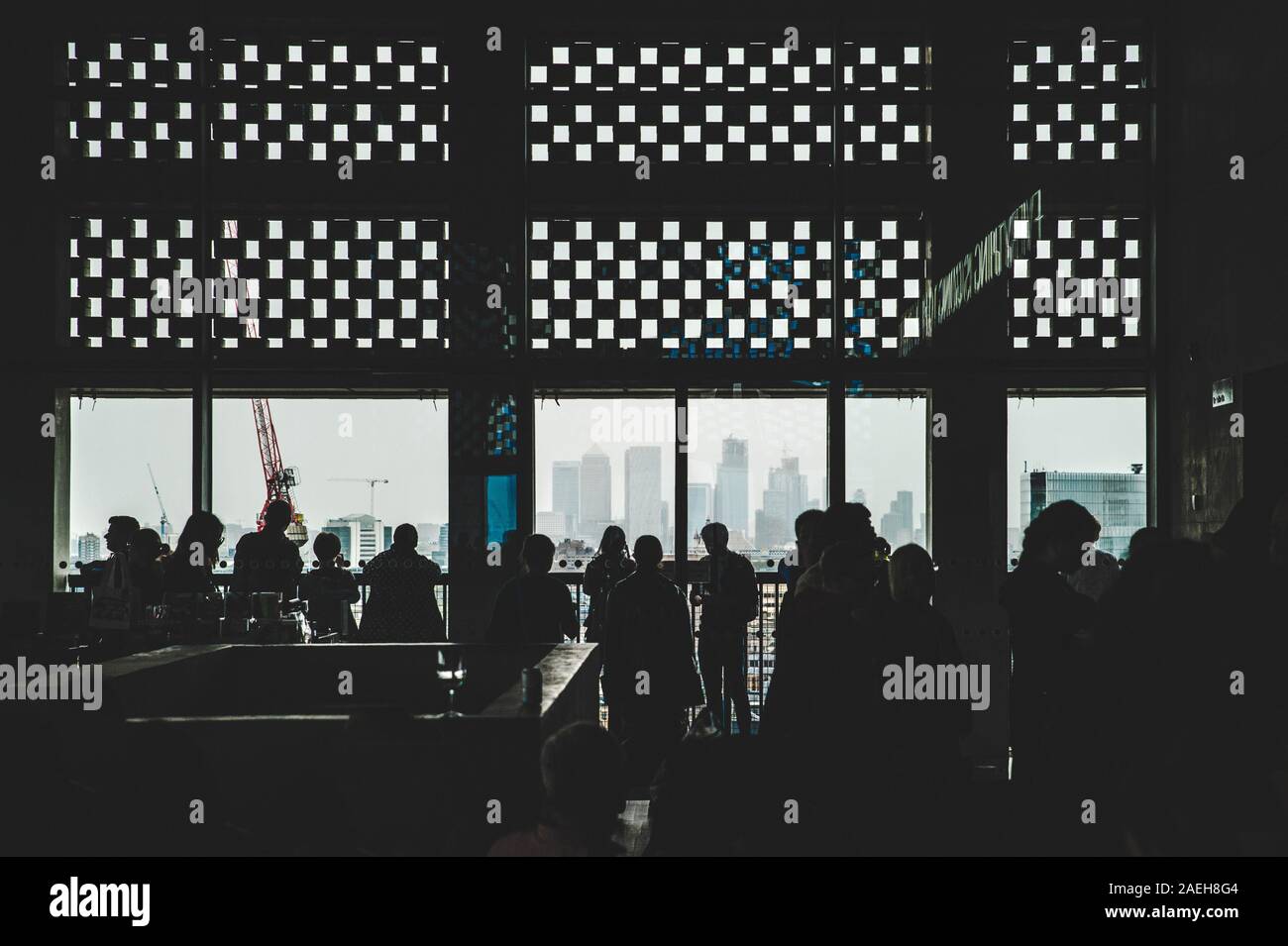 Tourist at the top floor of Tate Modern: London art museum. London City ...