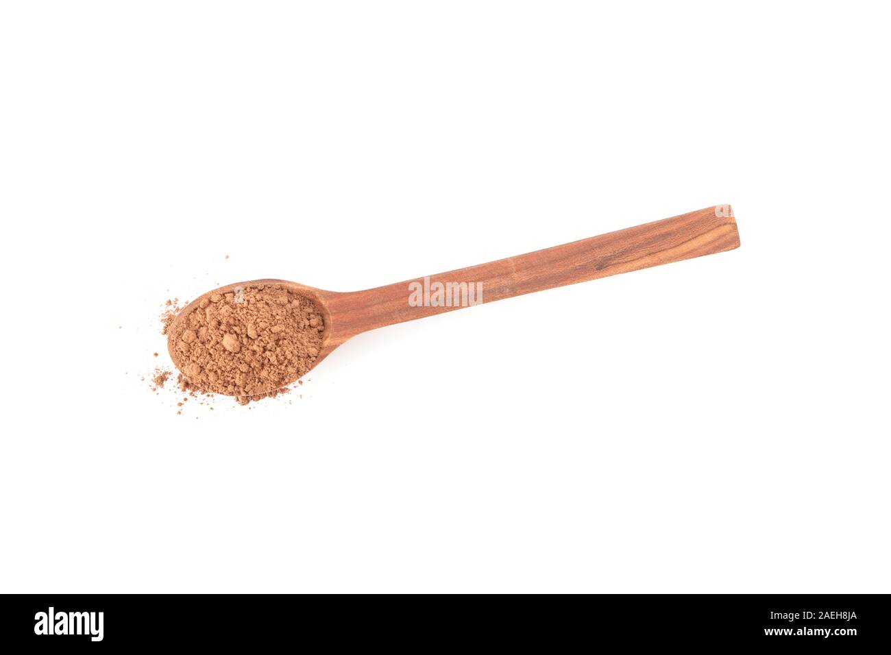 Wooden spoon with cocoa powder isolated on white background Stock Photo ...