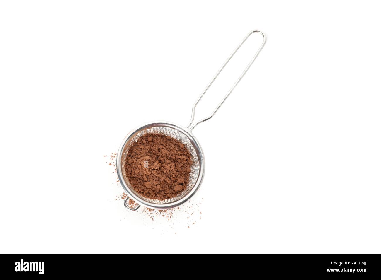 Strainer with cocoa powder isolated on white background Stock Photo - Alamy