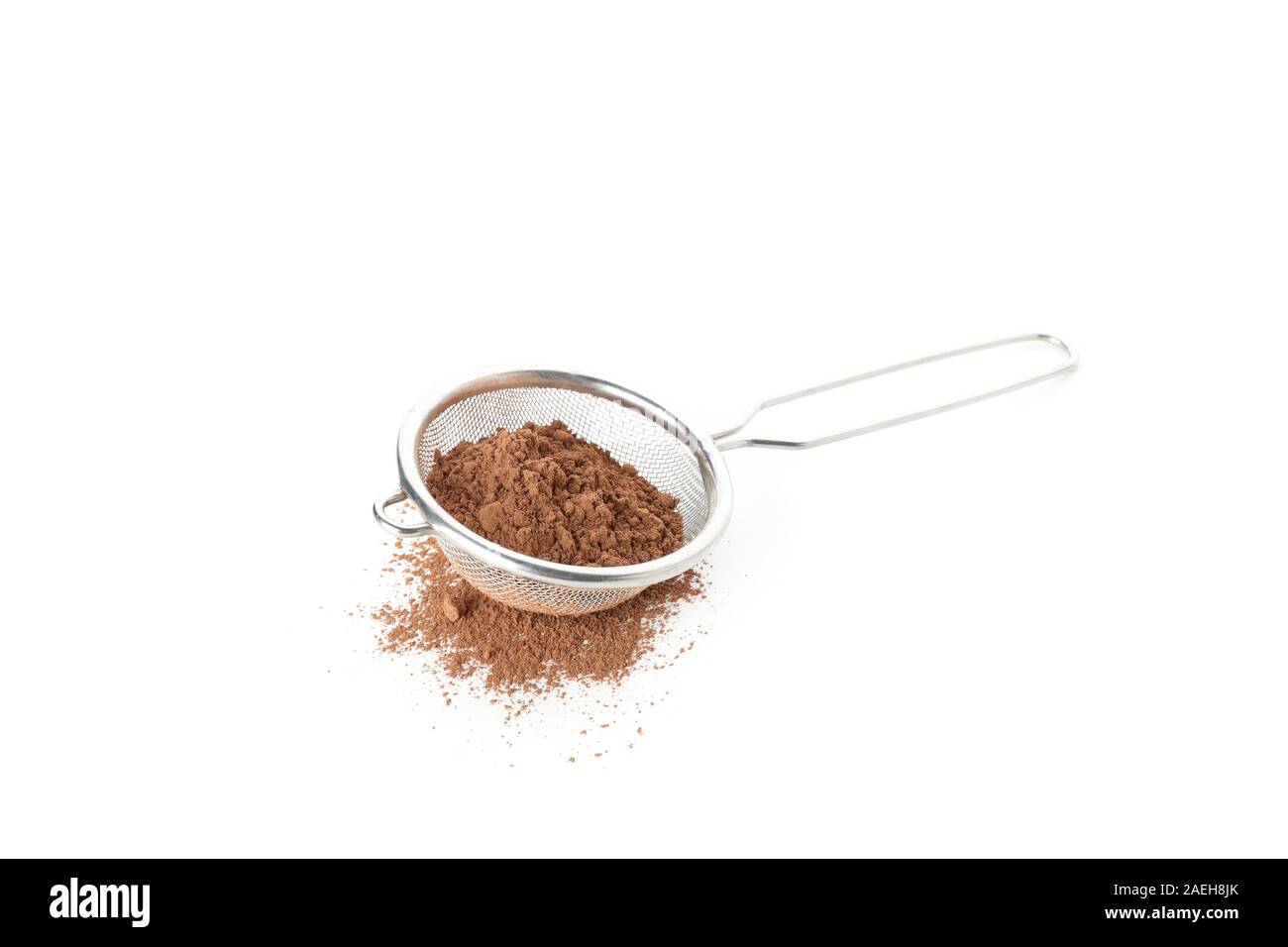 Strainer with cocoa powder isolated on white background Stock Photo - Alamy
