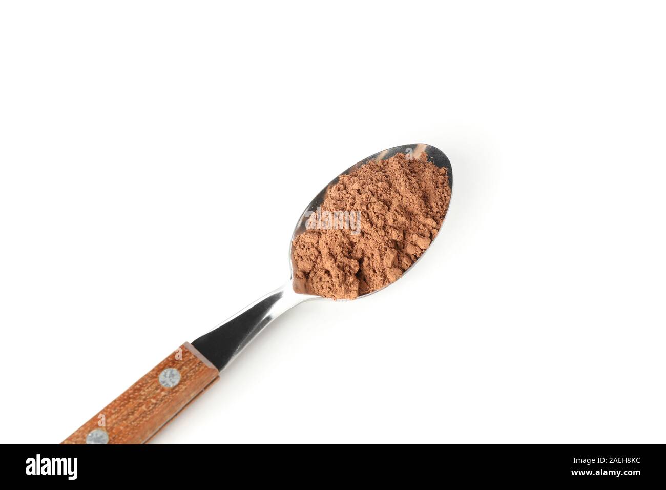 Spoon with cocoa powder isolated on white background Stock Photo - Alamy