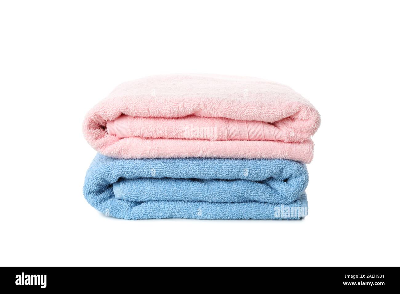 Stack of color towels isolated on white background Stock Photo - Alamy