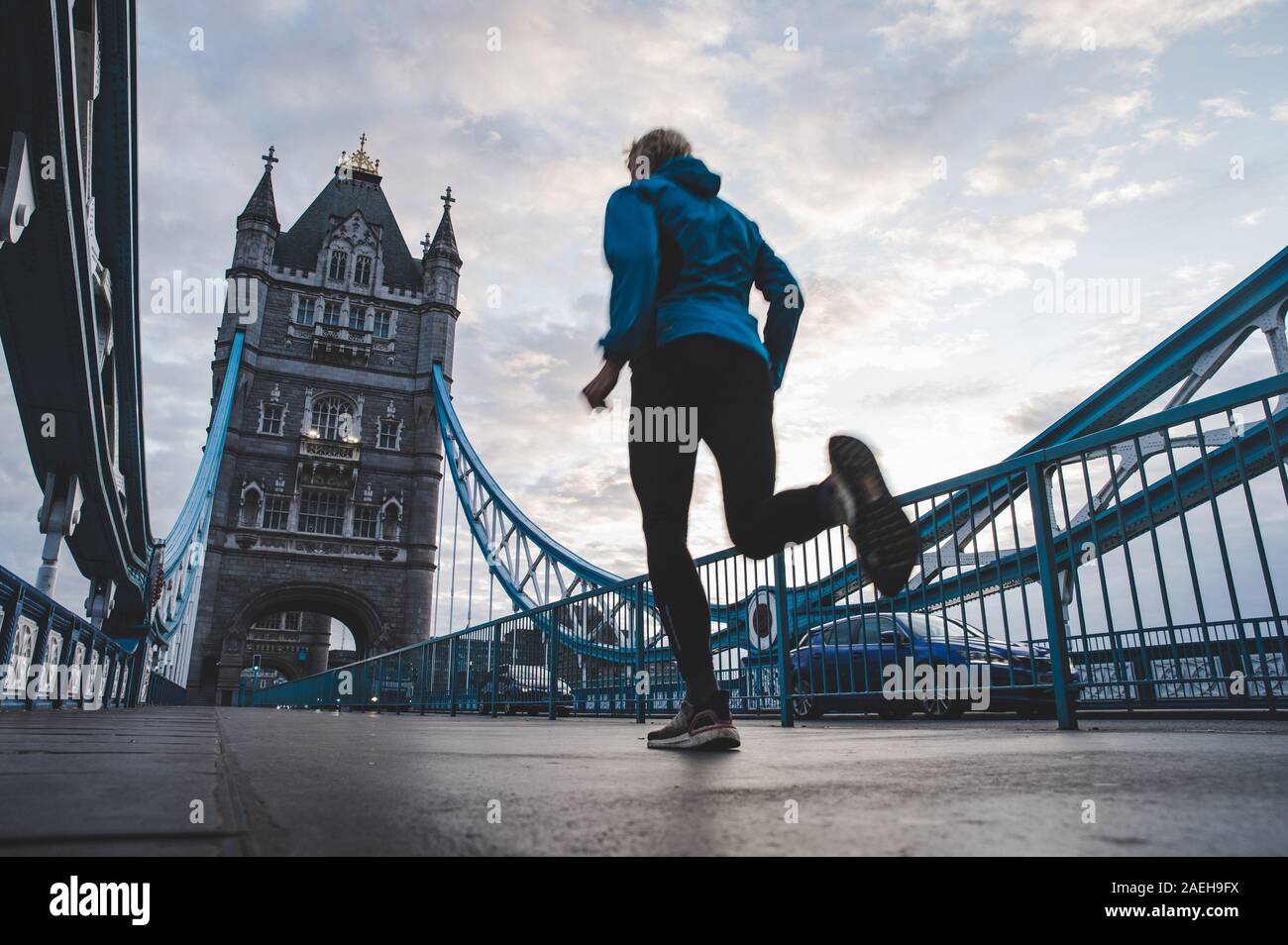 Morning run on Tower Bridge in London, UK Stock Photo - Alamy