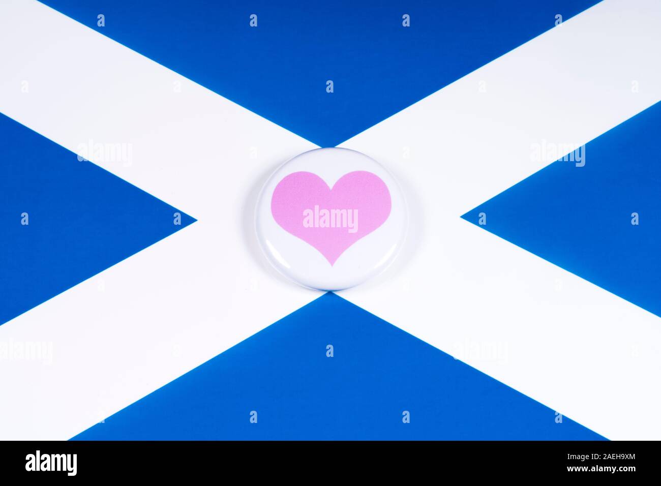 A pink heart symbol, pictured over the flag of Scotland Stock Photo - Alamy