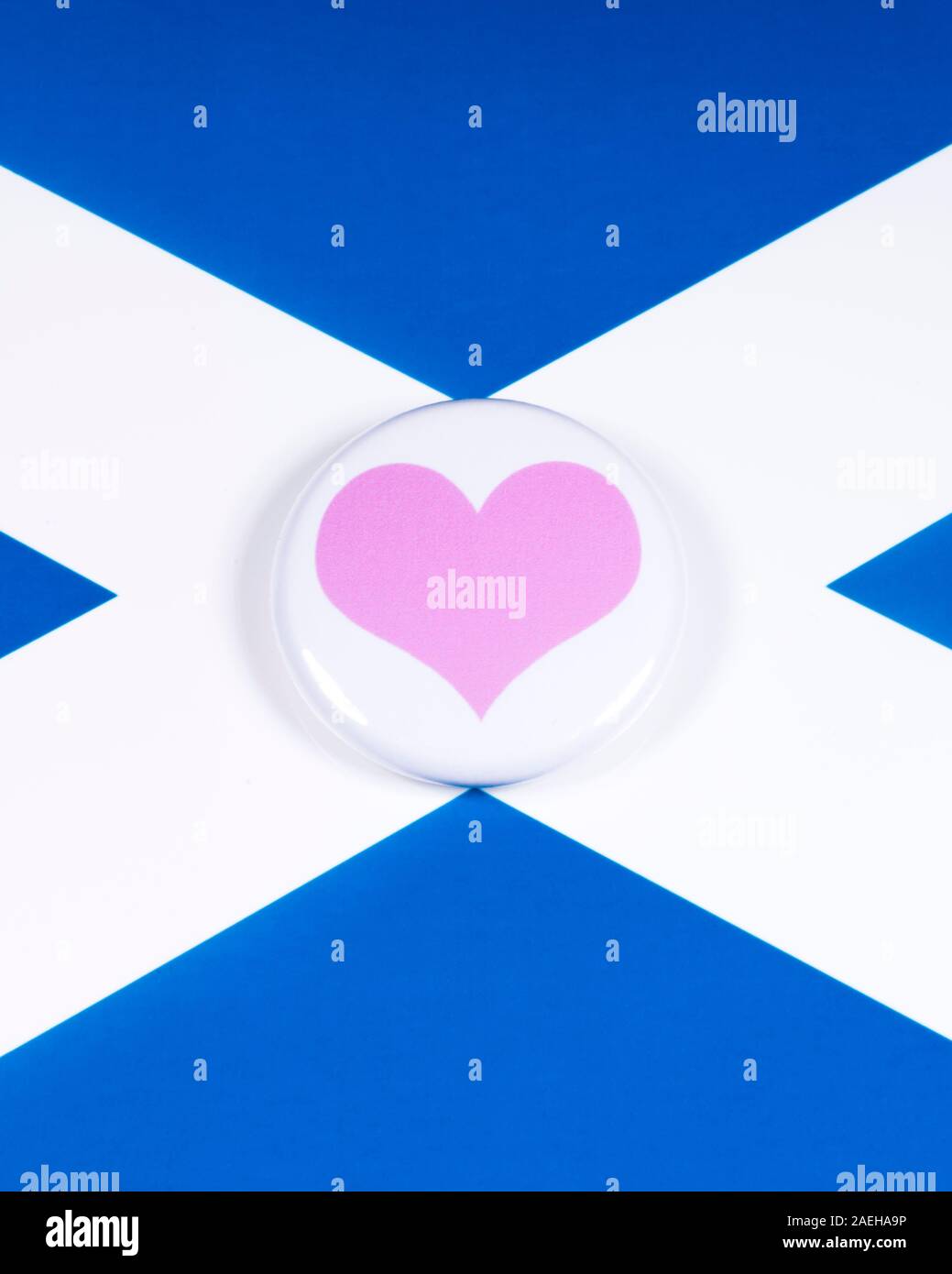 A pink heart symbol, pictured over the flag of Scotland Stock Photo - Alamy