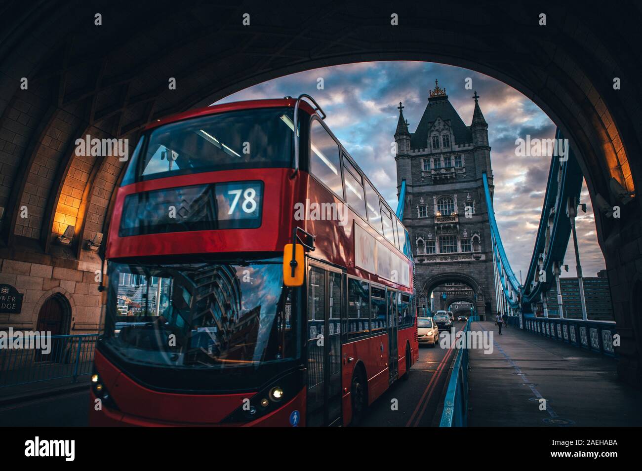 Classic red double decker at the tower Bridge in London. UK. Traffic in ...