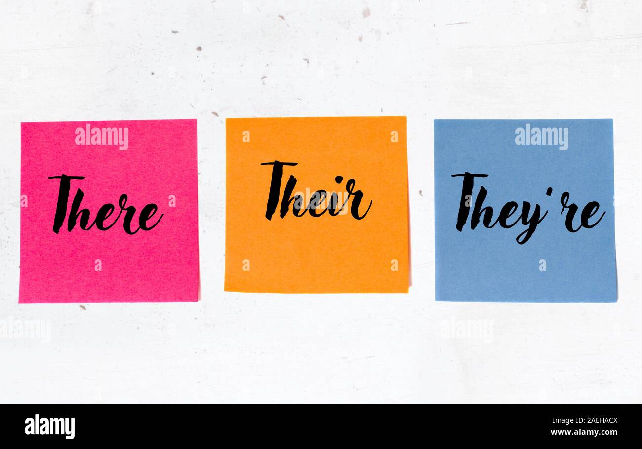 Grammar of there, their, they're on three sticky notes Stock Photo - Alamy