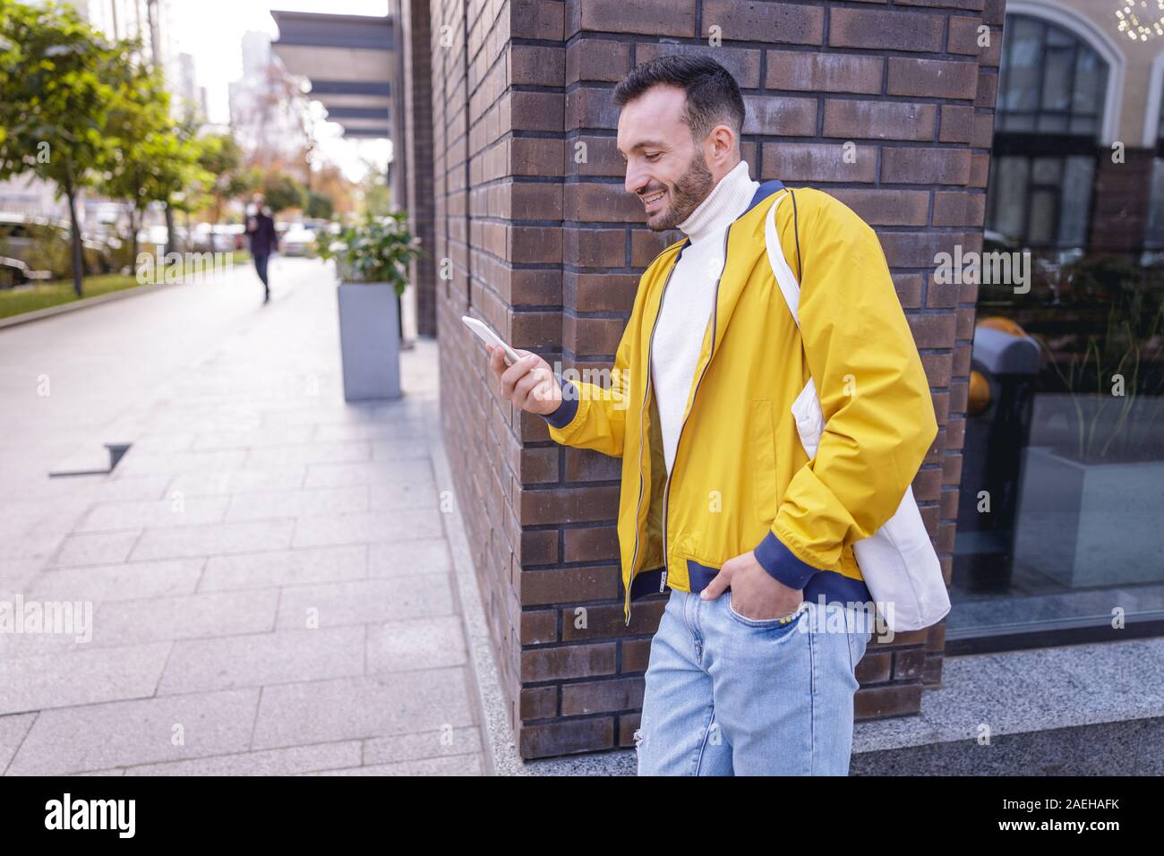 Handsome bearded male person waiting for his friend Stock Photo - Alamy