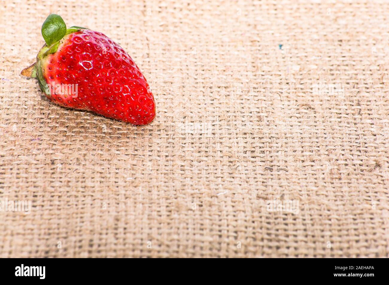 Red strawberry, fresh fruit on rustic background Stock Photo - Alamy