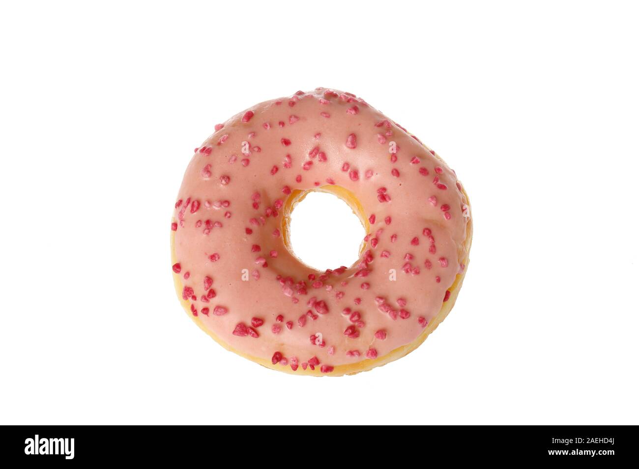 High angle view of a ping glazed donut isolated on white background ...