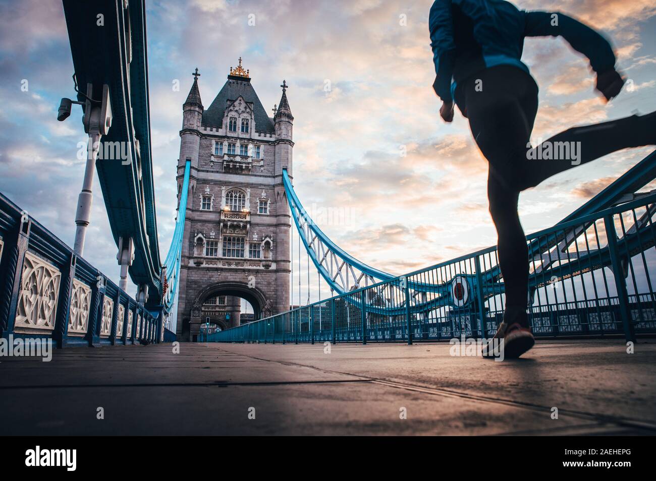 running in London Concept photo. Man running on Tower bridge. London ...