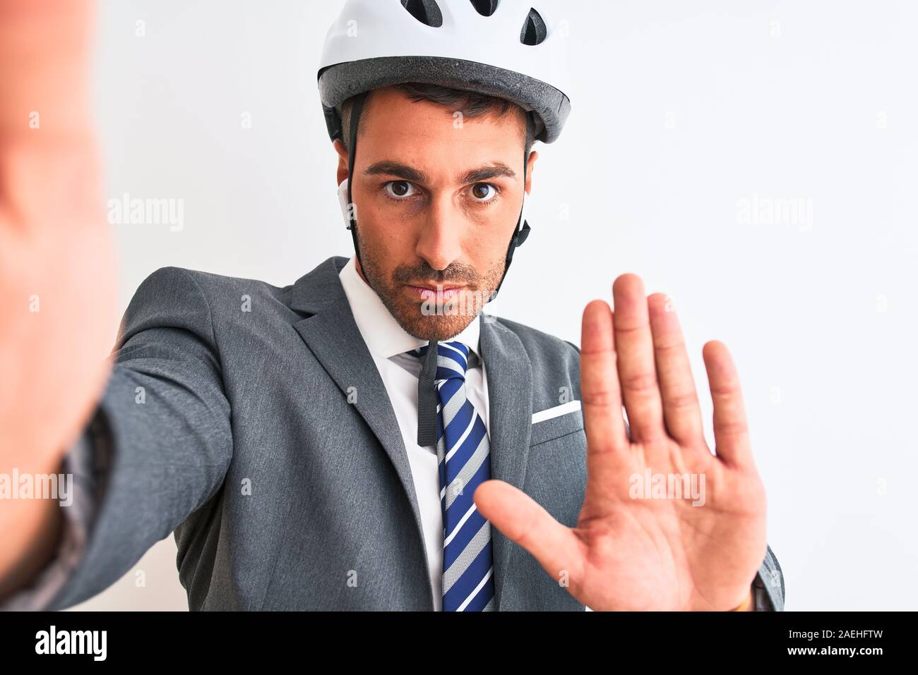 Young Handsome Business Man Wearing Bike Helmet Taking A Selfie Over