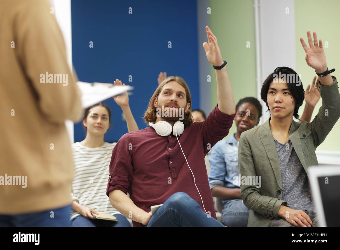 Voting raising hands hi-res stock photography and images - Alamy