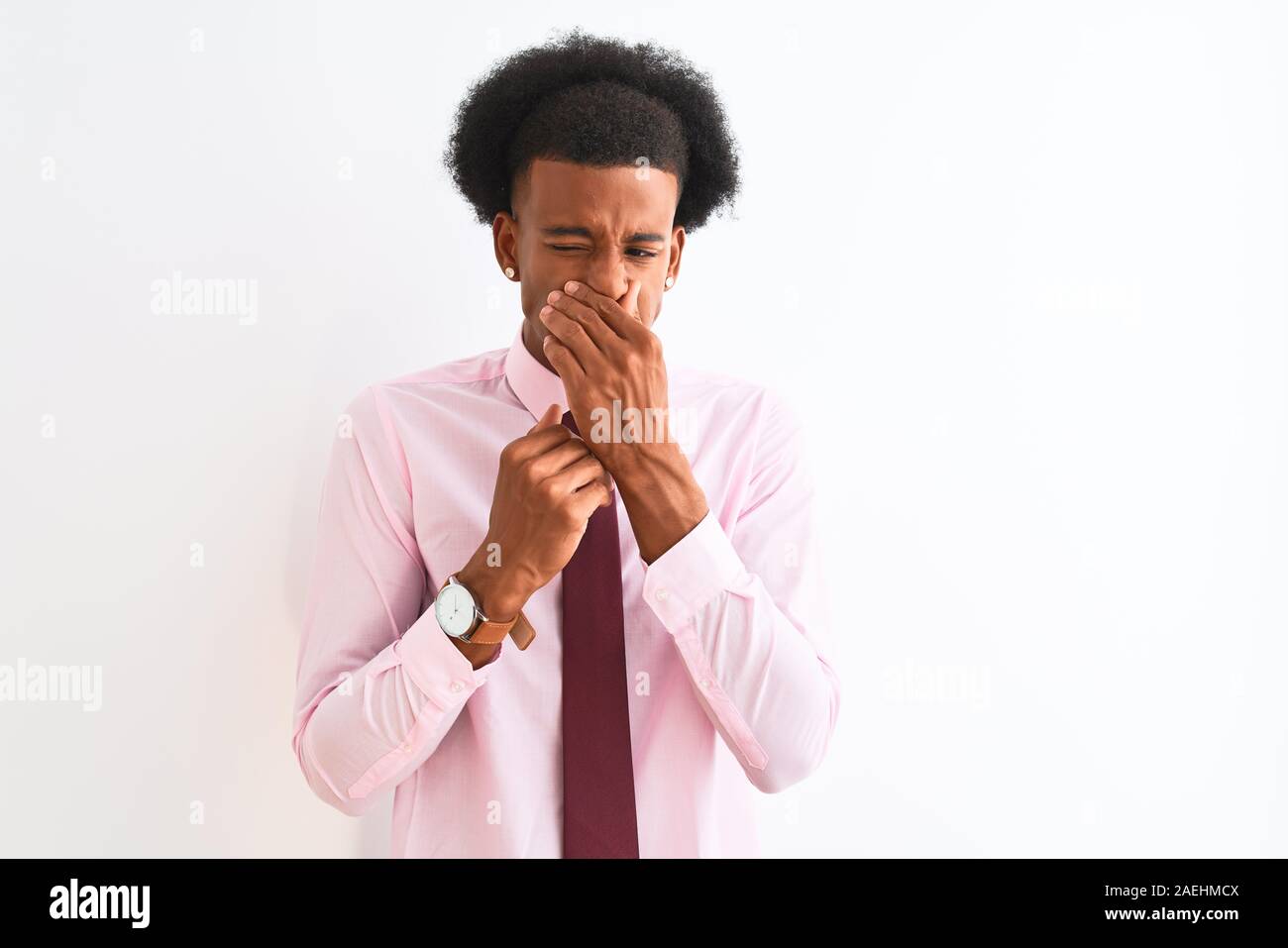 Young african american businessman wearing tie standing over isolated ...