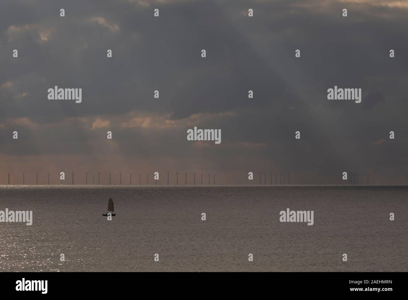 small sialing boat going past Brighton wind farm Stock Photo - Alamy