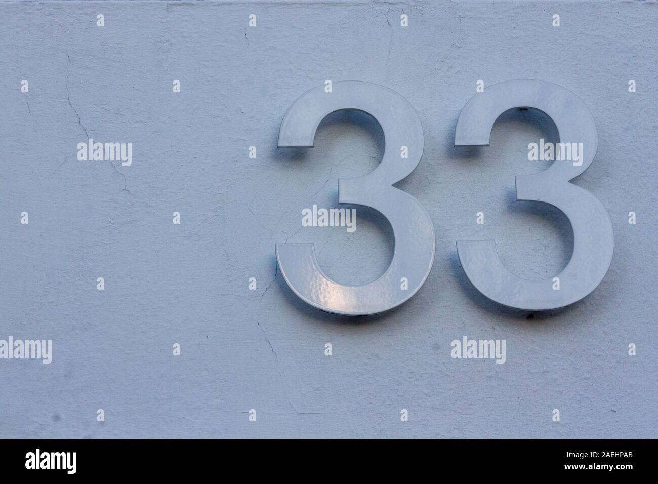 House number 33 Stock Photo - Alamy