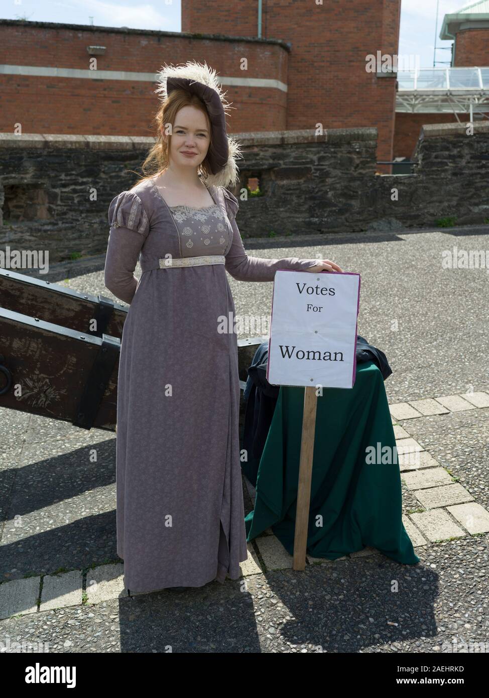Woman standing placard saying hi-res stock photography and images - Alamy