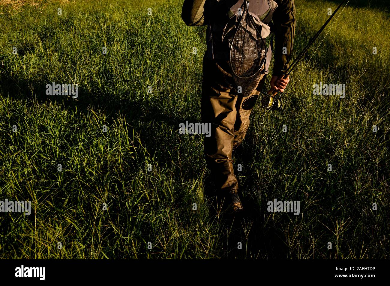 Man walking with fish hi-res stock photography and images - Alamy